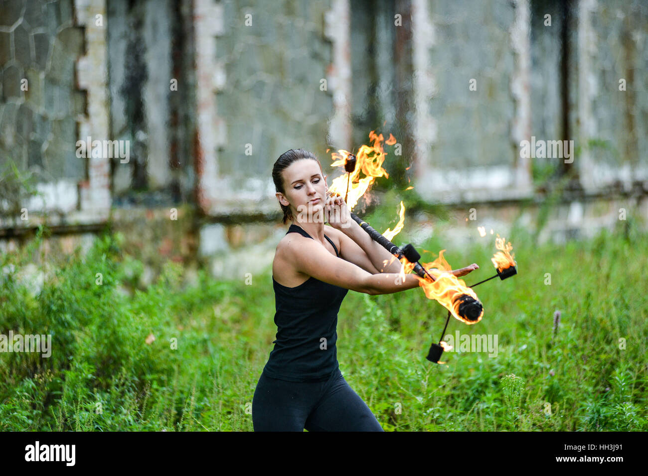 play with fire show on the shore of the sea Stock Photo - Alamy