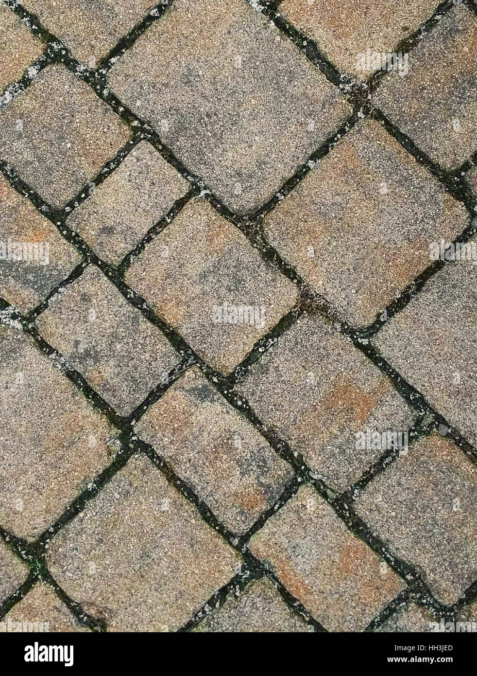Cobblestone background texture in a diagonal alignment Stock Photo - Alamy