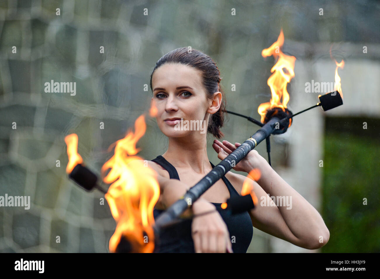 play with fire show on the shore of the sea Stock Photo - Alamy