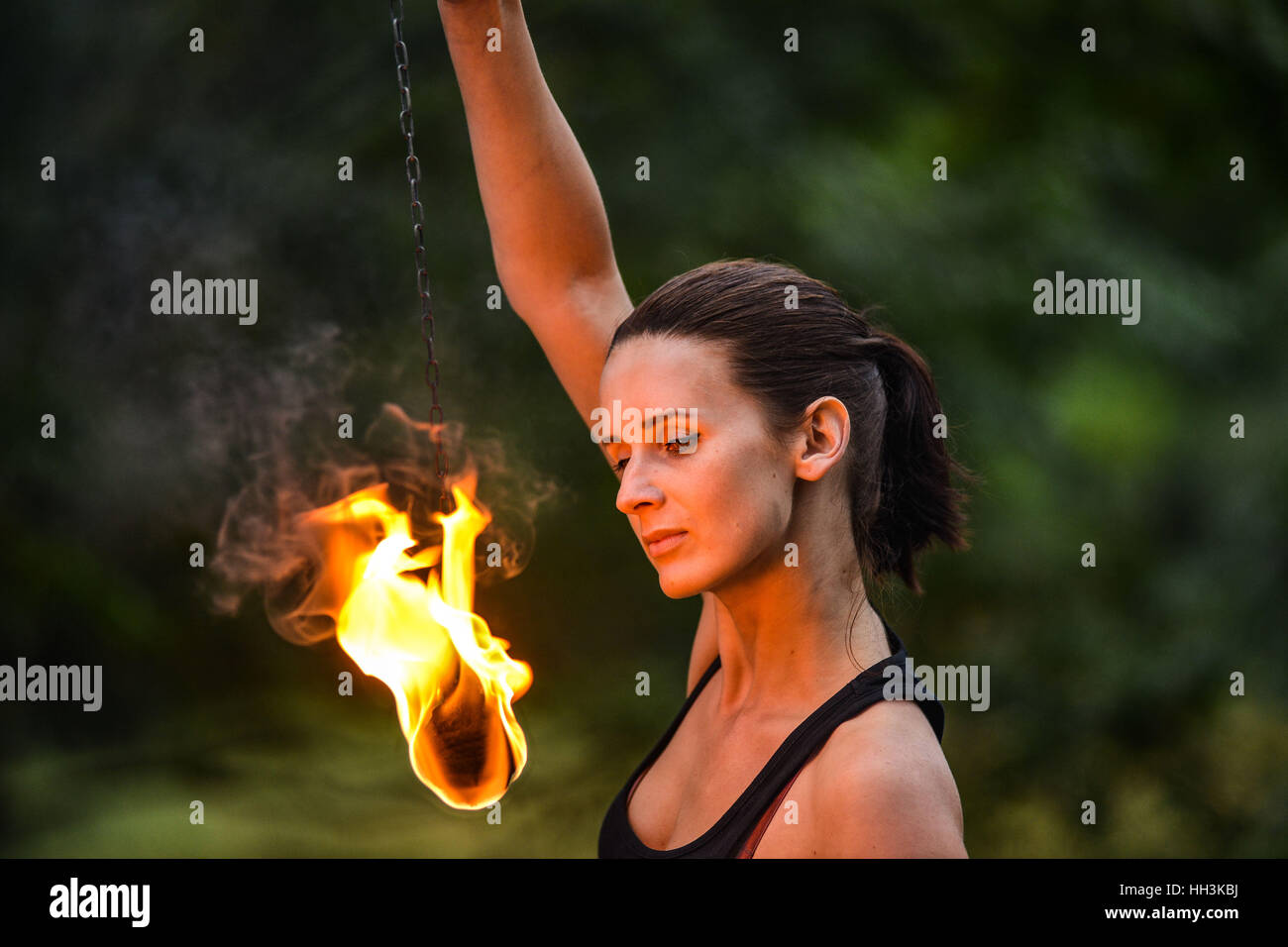 play with fire show on the shore of the sea Stock Photo - Alamy