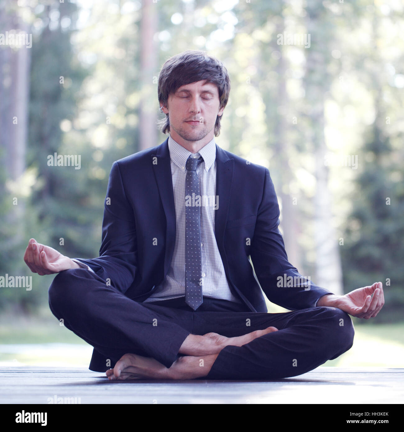 Man lotus position suit hi-res stock photography and images - Alamy