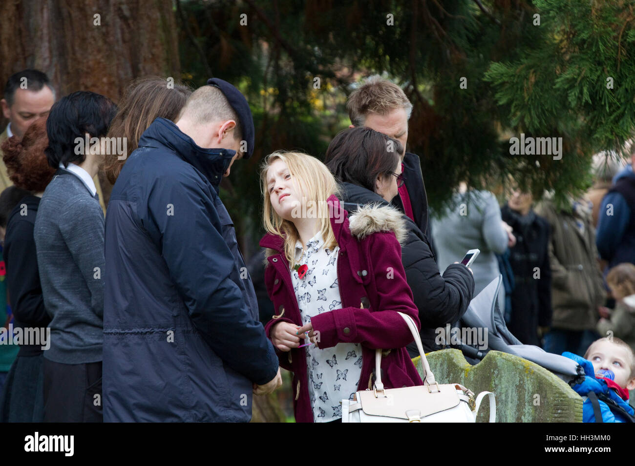 Teenage girl making an appealing face at an adult Stock Photo - Alamy