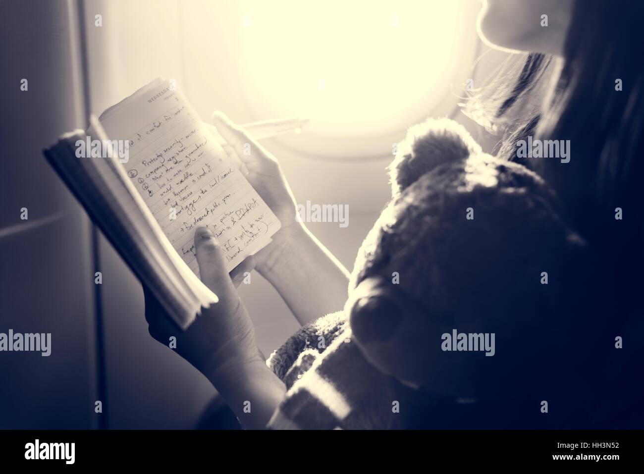 Woman Reading Book Plane Flying Concept Stock Photo - Alamy