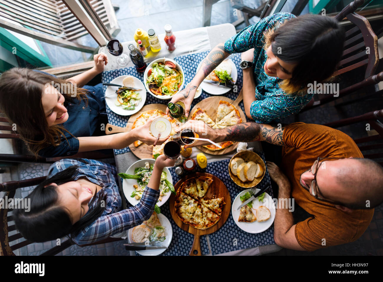 Friends Eating Pizza Party Together Concept Stock Photo - Alamy