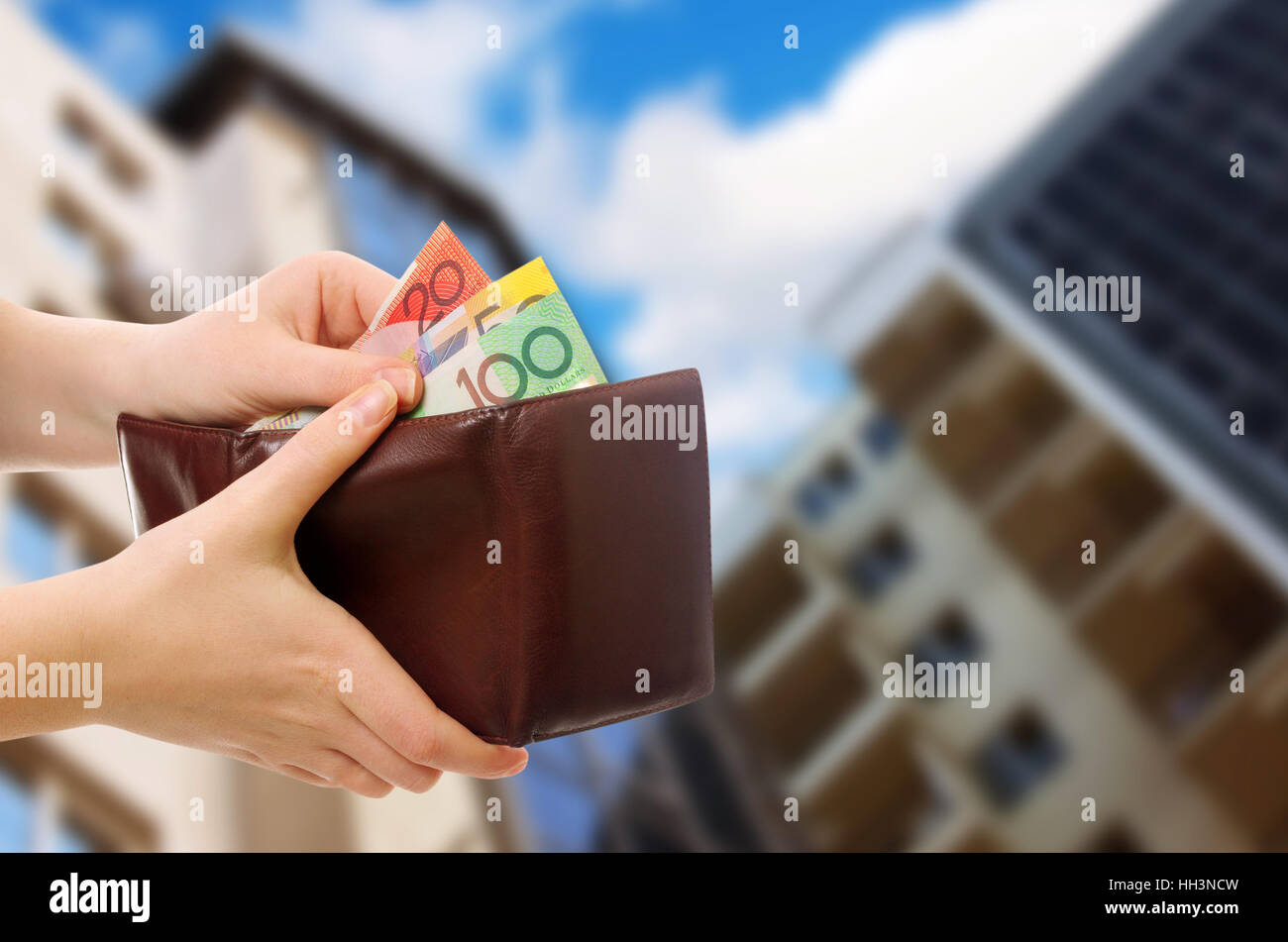 australian money in wallet on real estate background Stock Photo - Alamy