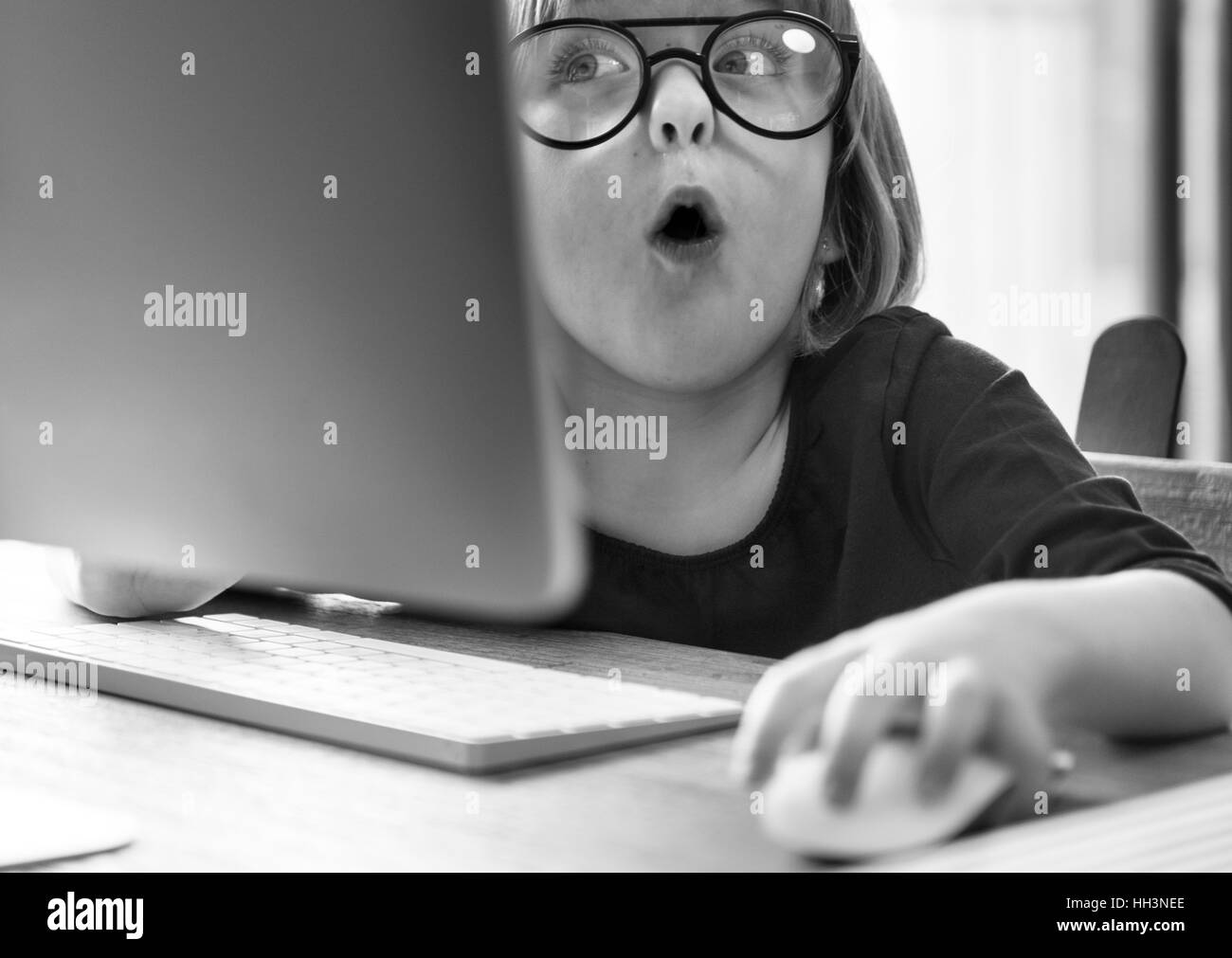 Little Girl Using Device Concept Stock Photo - Alamy