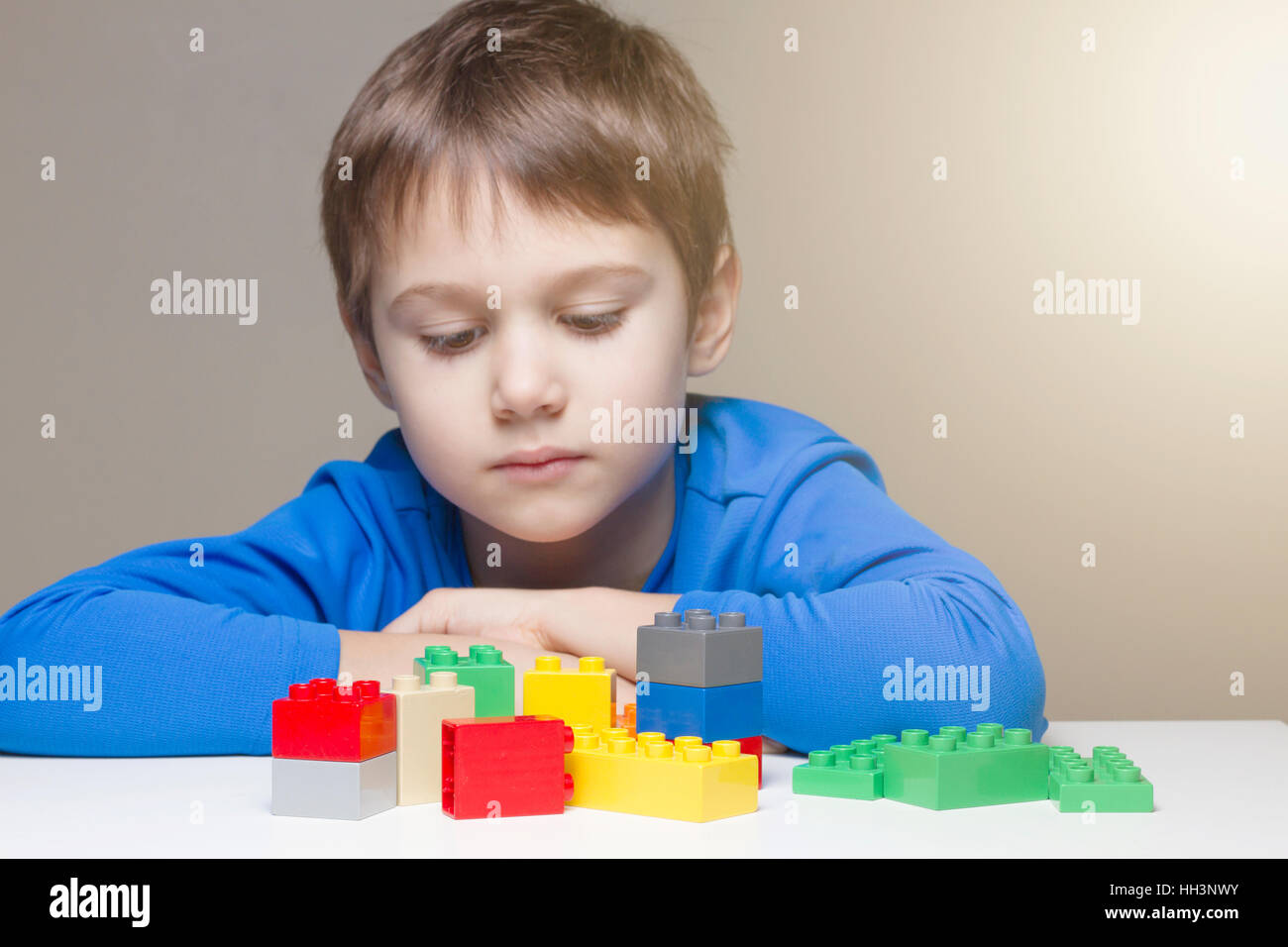 Sad toy brick hi-res stock photography and images - Alamy