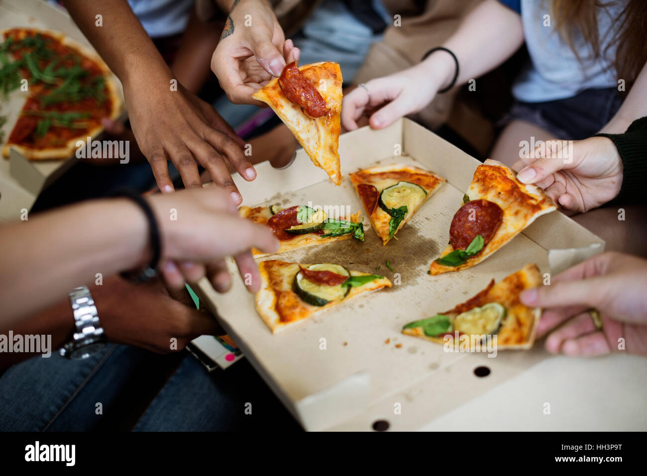 Pizza Sharing Togetherness Friendship Community Concept Stock Photo - Alamy