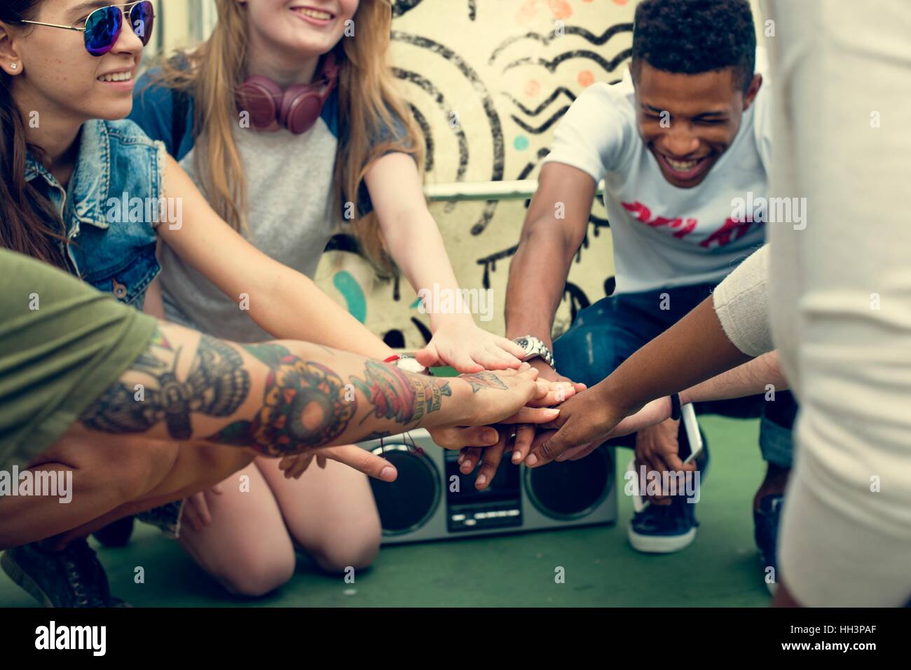 Boys hands together participation hi-res stock photography and images ...