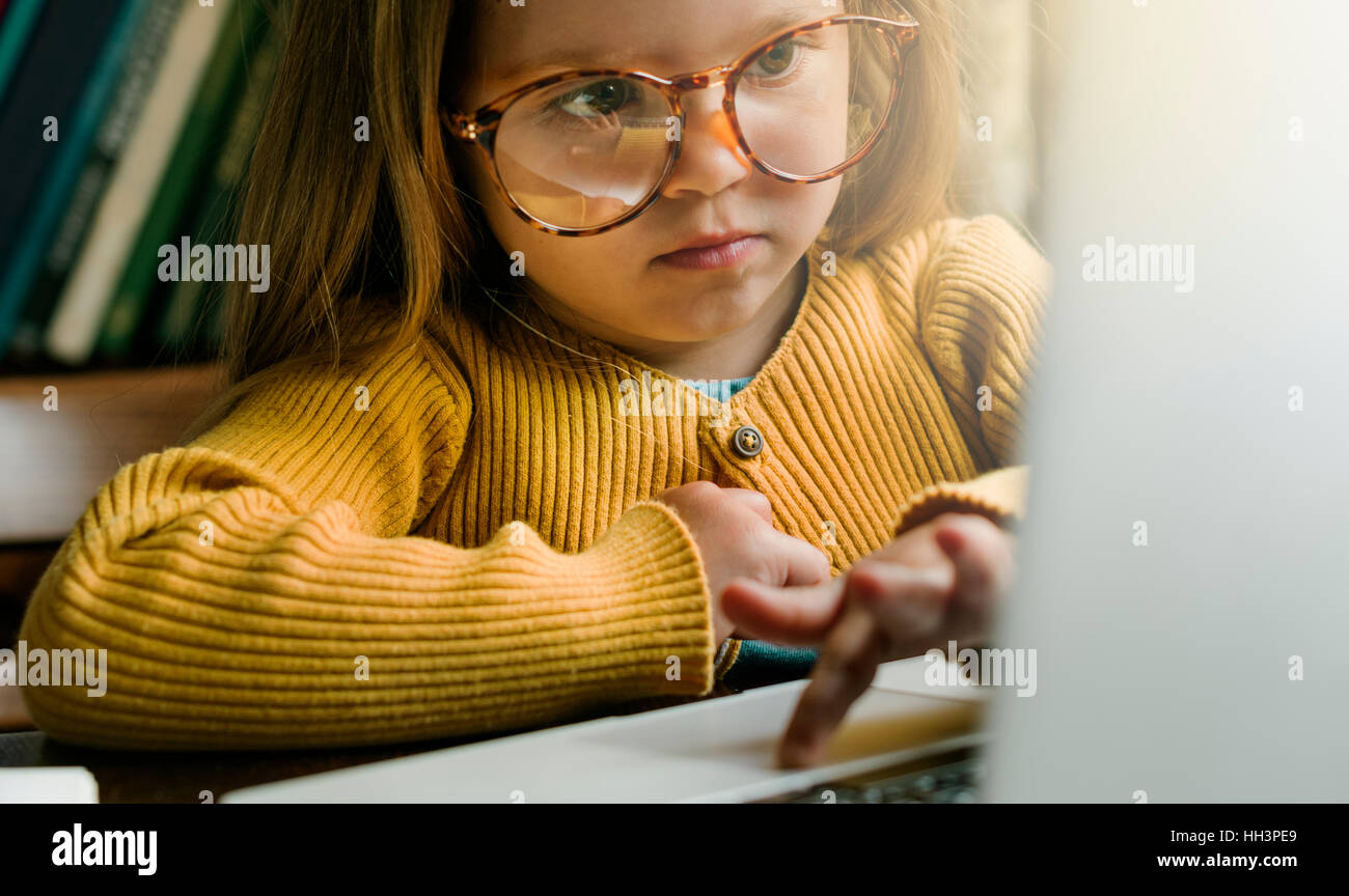 Little Girl Using Digital Laptop E-learning Concept Stock Photo - Alamy