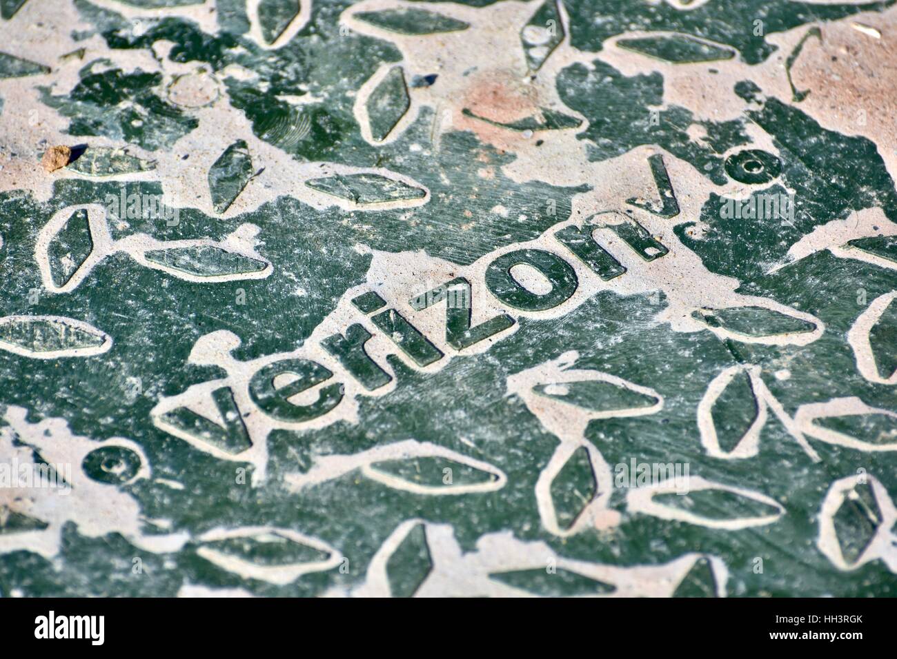 A Verizon box cover for underground electrical Stock Photo - Alamy