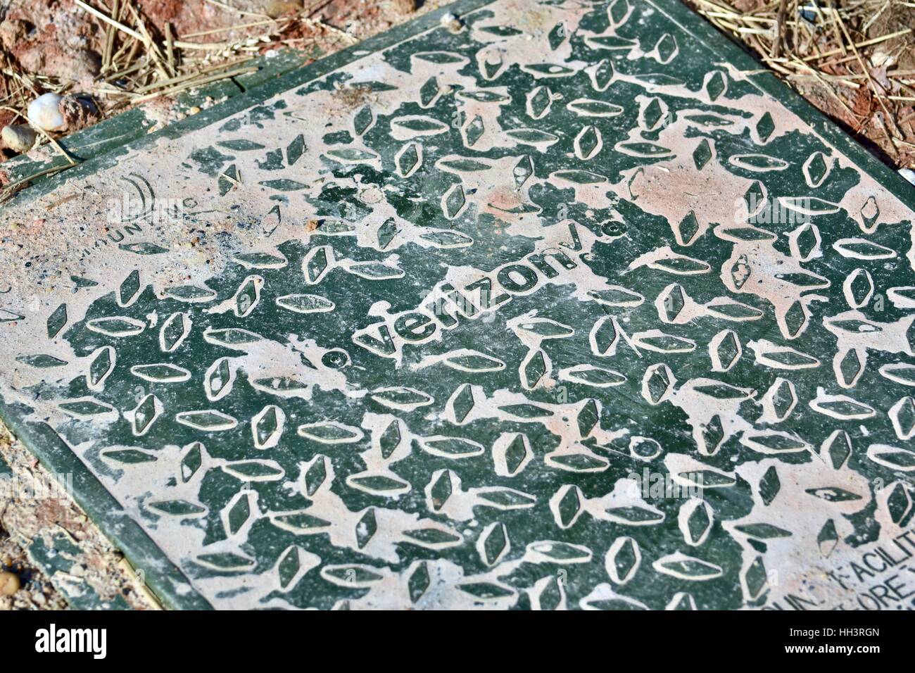 A Verizon box cover for underground electrical Stock Photo - Alamy