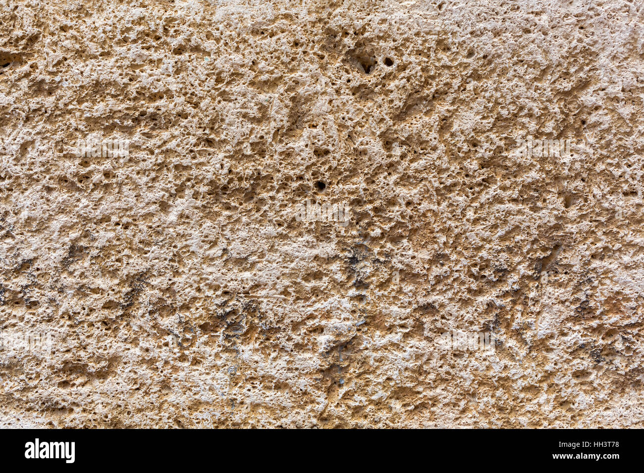 background texture from a stone wall of an old building in Tuscany ...