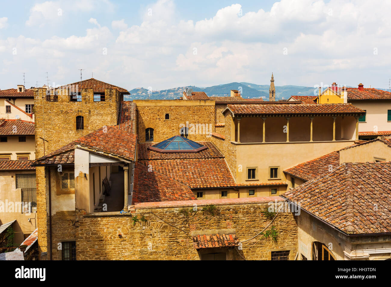 view over the roofs of old buildings in Florence, Italy Stock Photo - Alamy