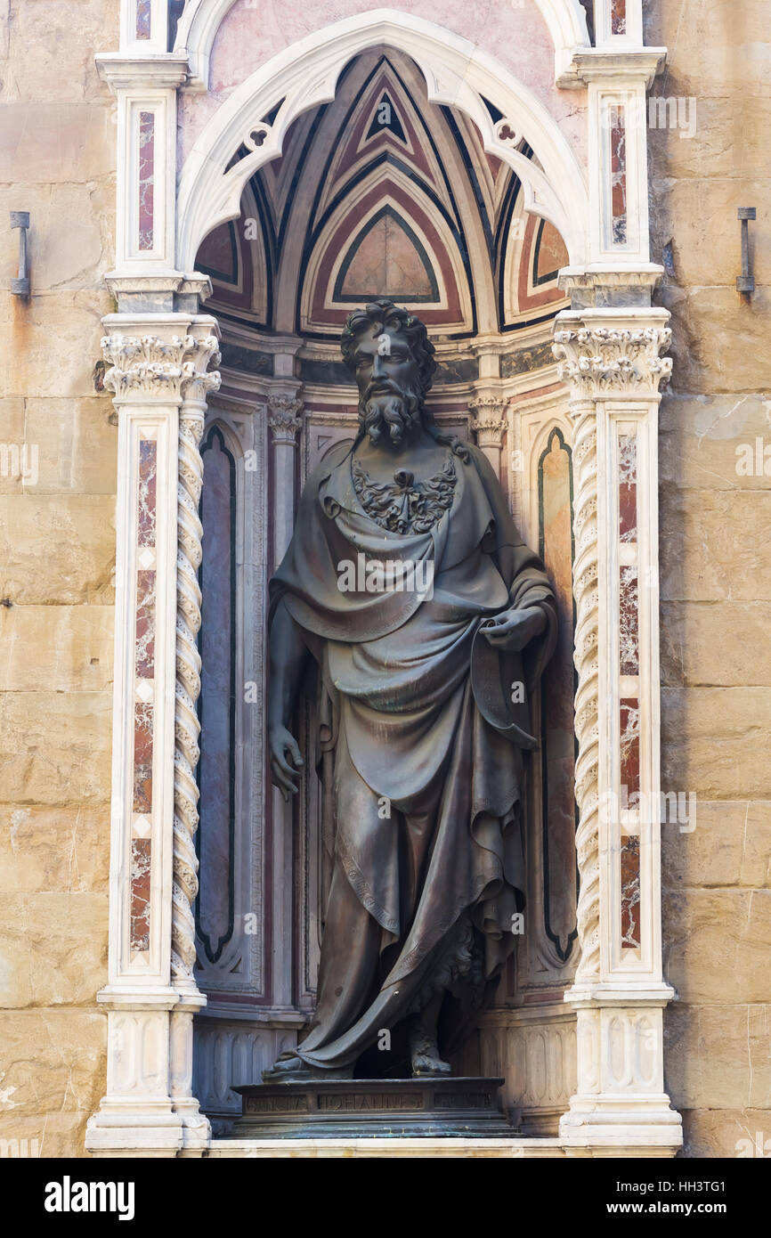 religious statue at a historical building in Florence, Italy Stock ...