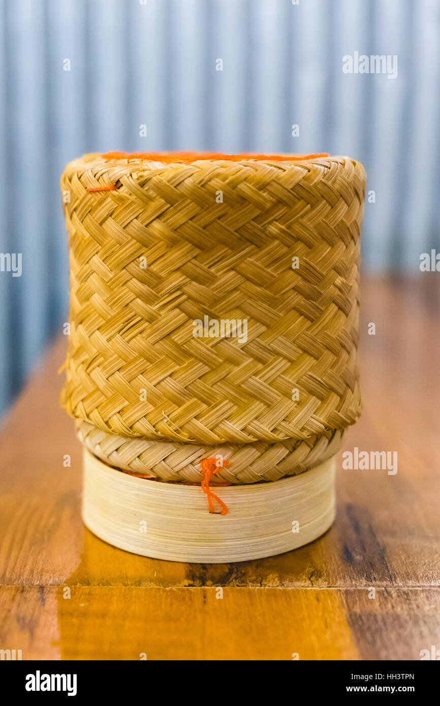 handmade wicker rice on wooden table Stock Photo - Alamy