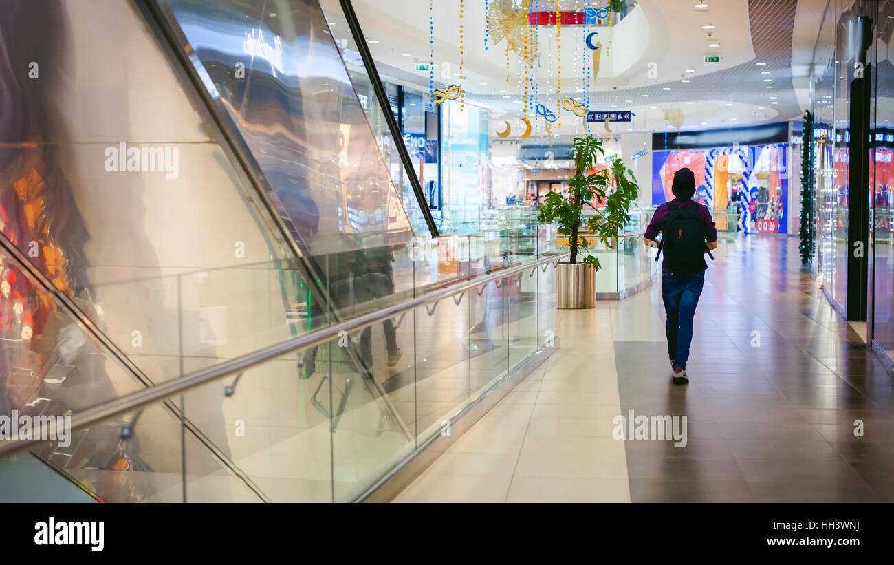 Man walking through shopping mall hi-res stock photography and images ...