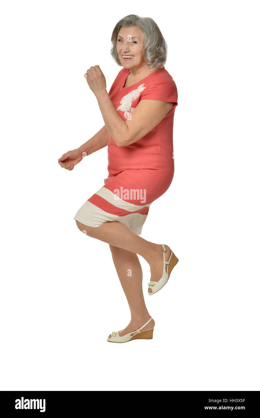 beautiful senior woman in pink dress Stock Photo - Alamy