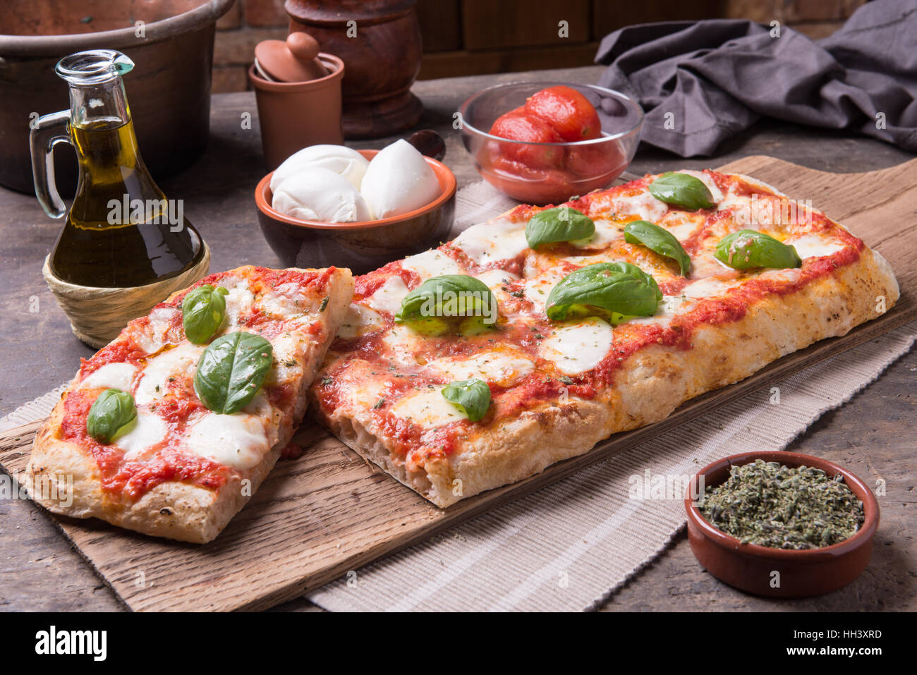 Rectangular shape and thick hand made romana's pizza Stock Photo - Alamy