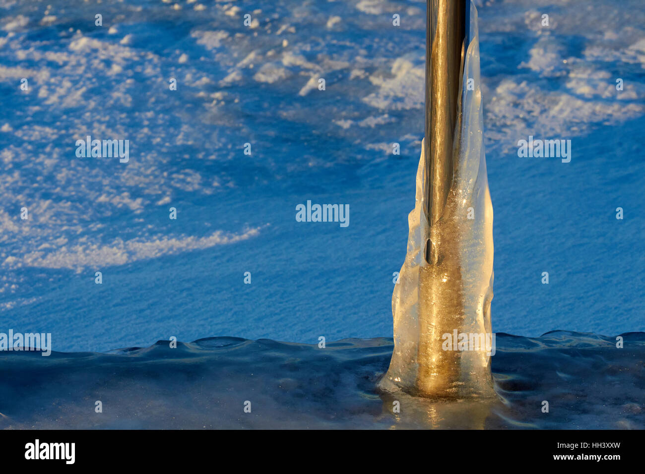 frozen metal pole Stock Photo - Alamy