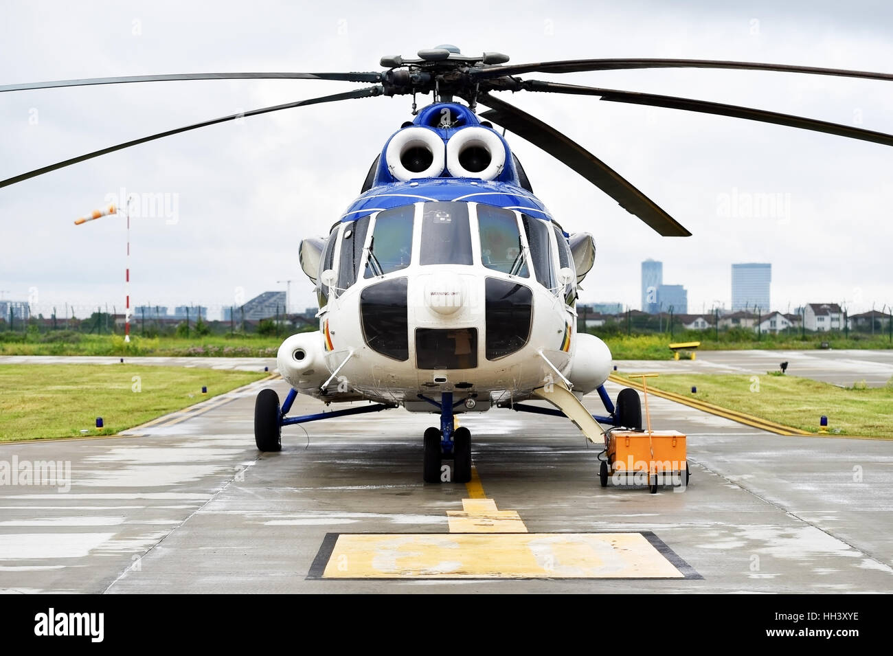 Detail with helicopter fuselage and rotor blade system on runway Stock ...