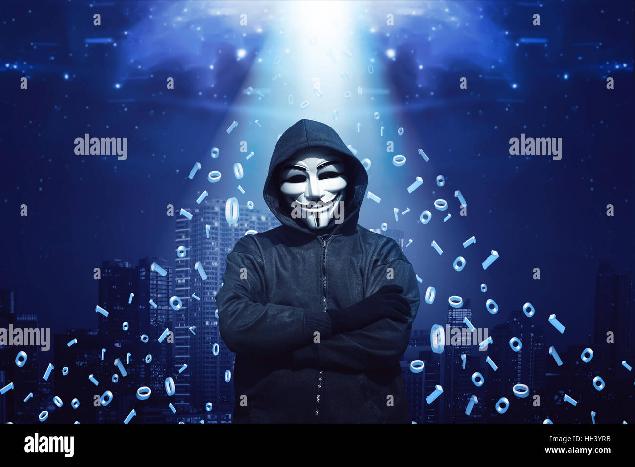 Hooded man with mask standing against binary code in background Stock ...