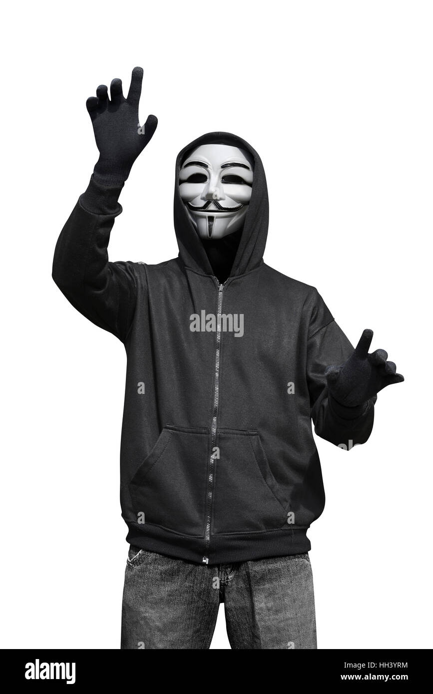 Man with anonymous mask touching something isolated over white ...