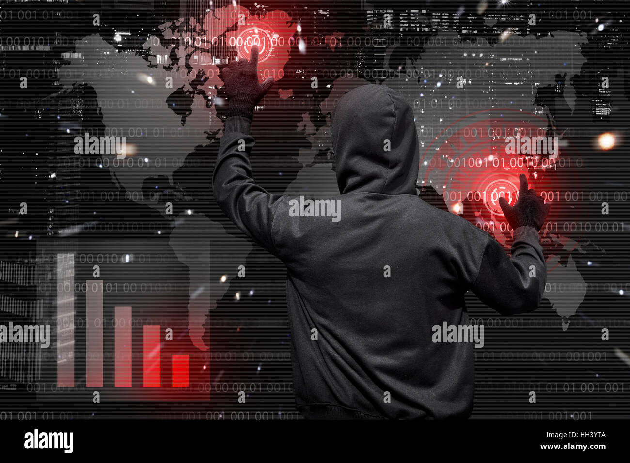 Back view of hooded hacker at work with virtual graphic user interface ...
