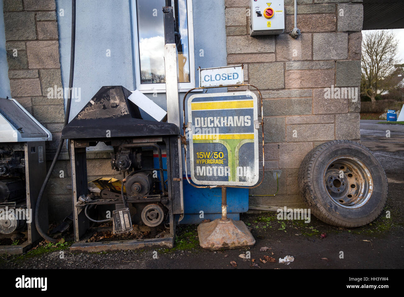 old duckams oil sign in rural village,rust,pattina,advert, advertising ...