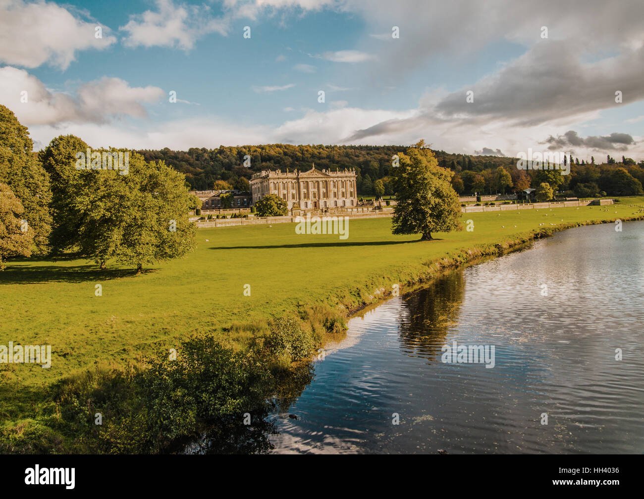 reflection of Chatsworth by the river Wye Derbyshire Ray Boswell Stock ...