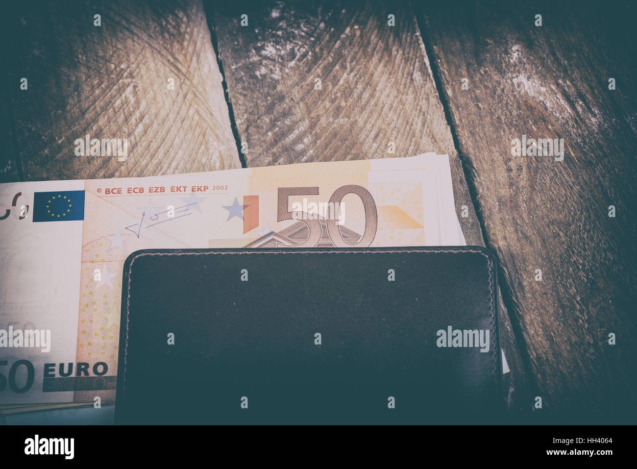Money stack in wallet hi-res stock photography and images - Alamy