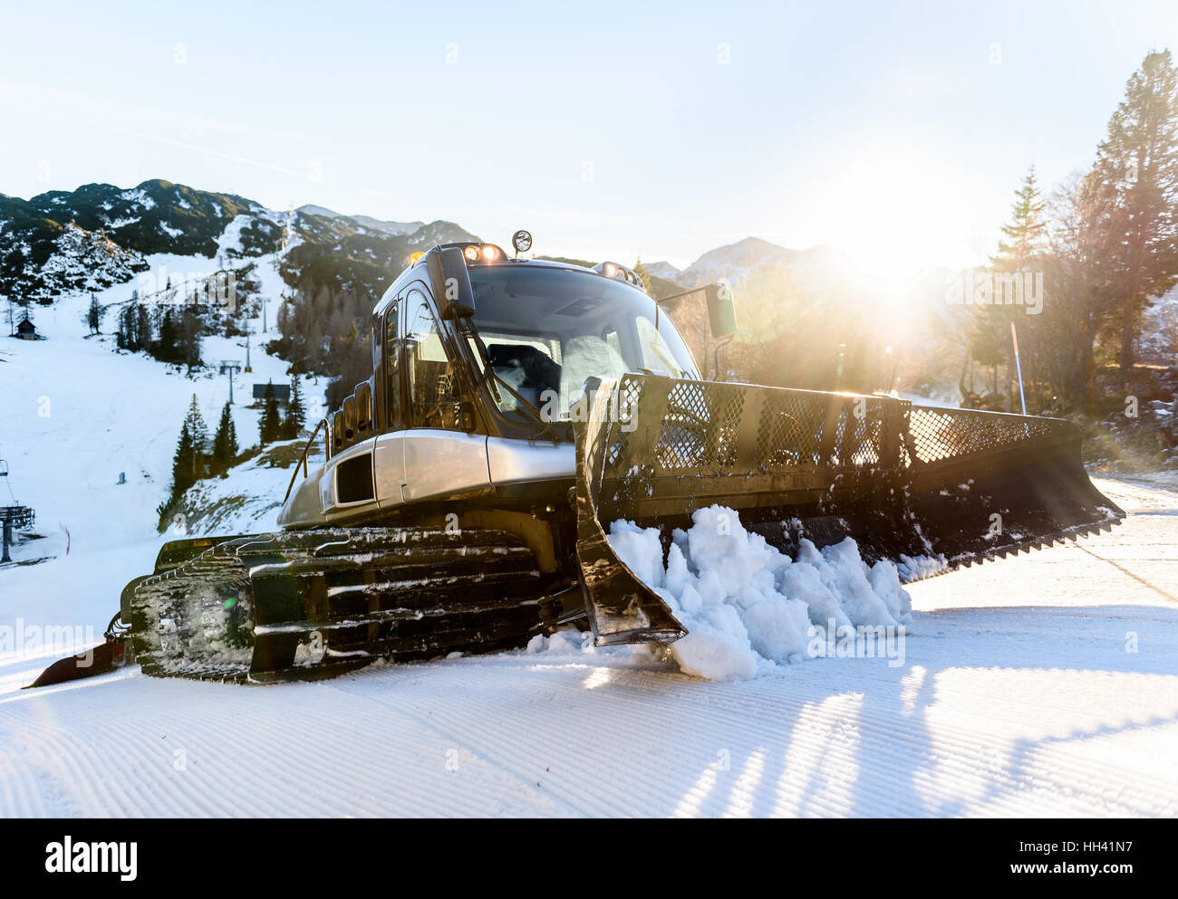 Snowplow Snowcat Ski slopes maintenance on the mountains ski resort ...
