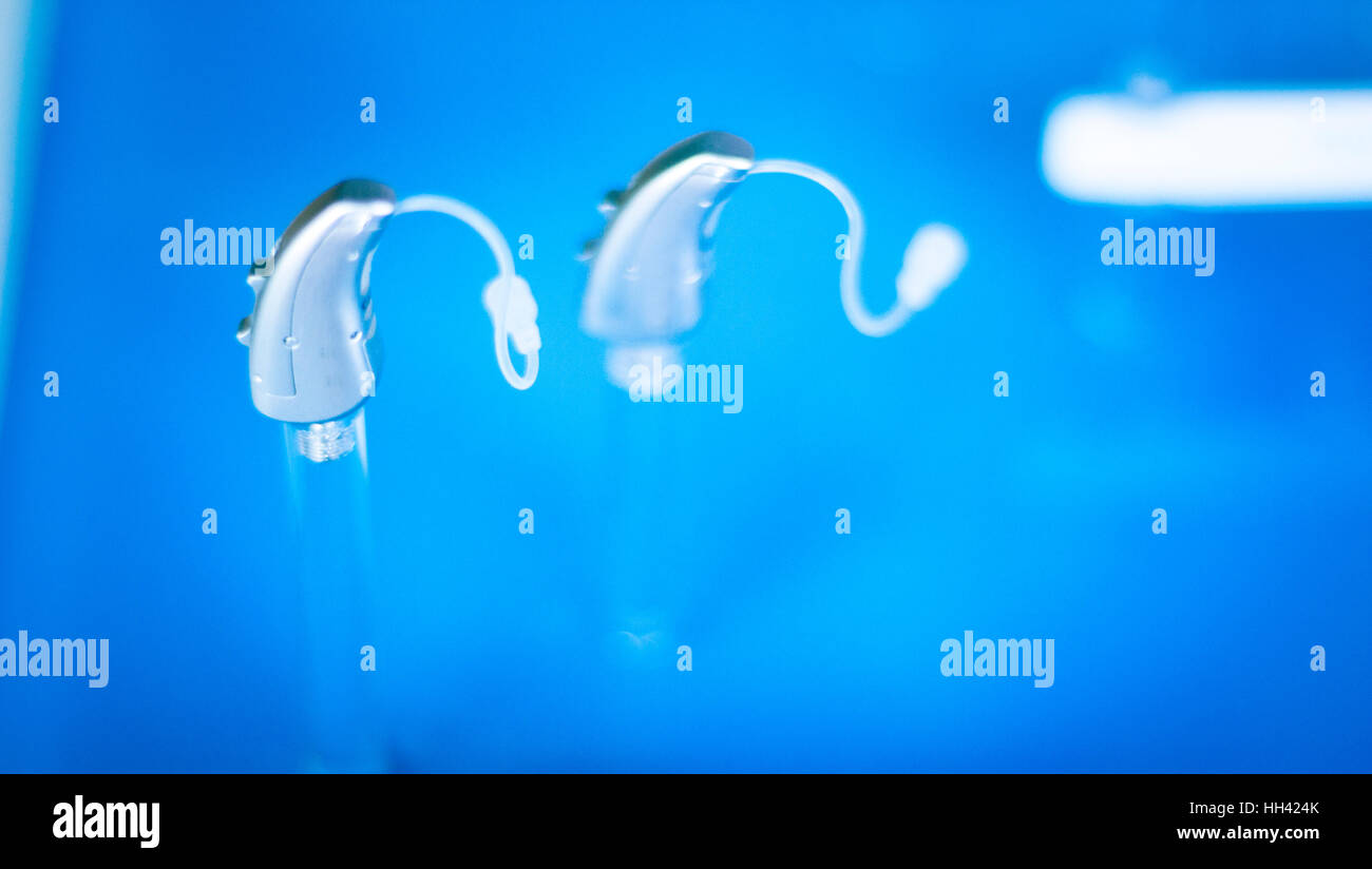 Modern high technology digital hearing aids in retail store shop window ...