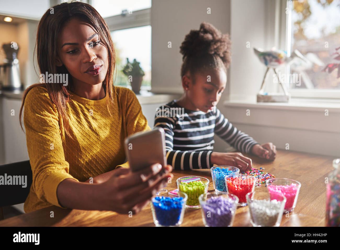 Mother forgetting child because cell phone, child sitting alone in ...