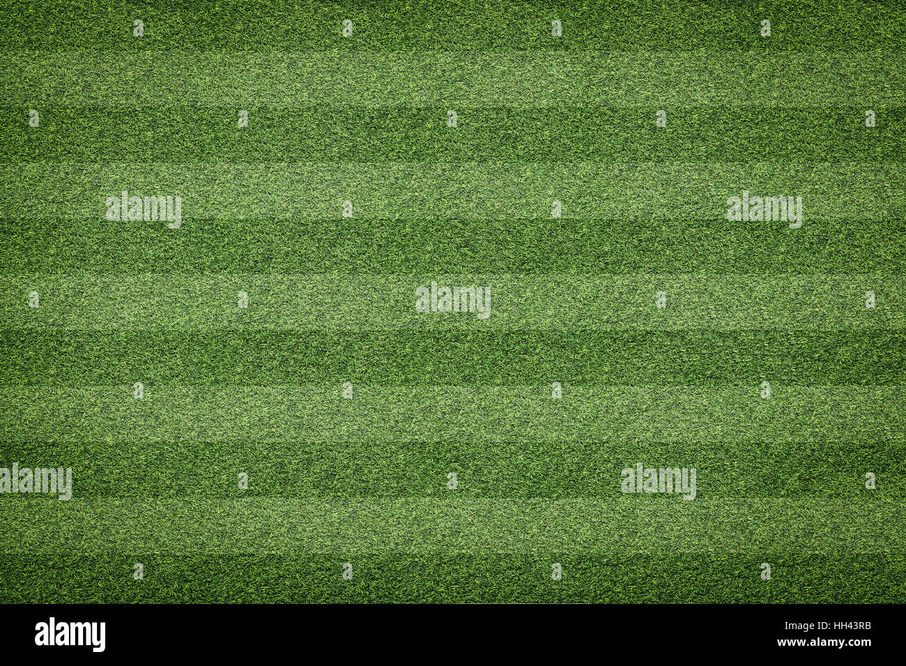 top view of stripe grass soccer field background Stock Photo - Alamy