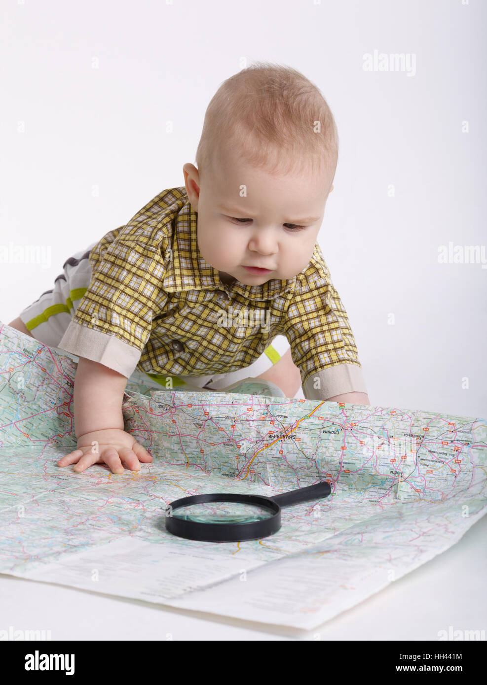 baby planning travel with map on white Stock Photo - Alamy