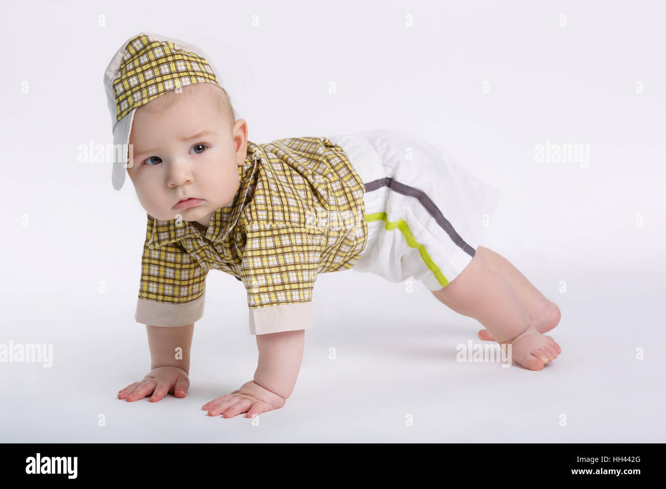 cute little boy making push-ups on white Stock Photo - Alamy