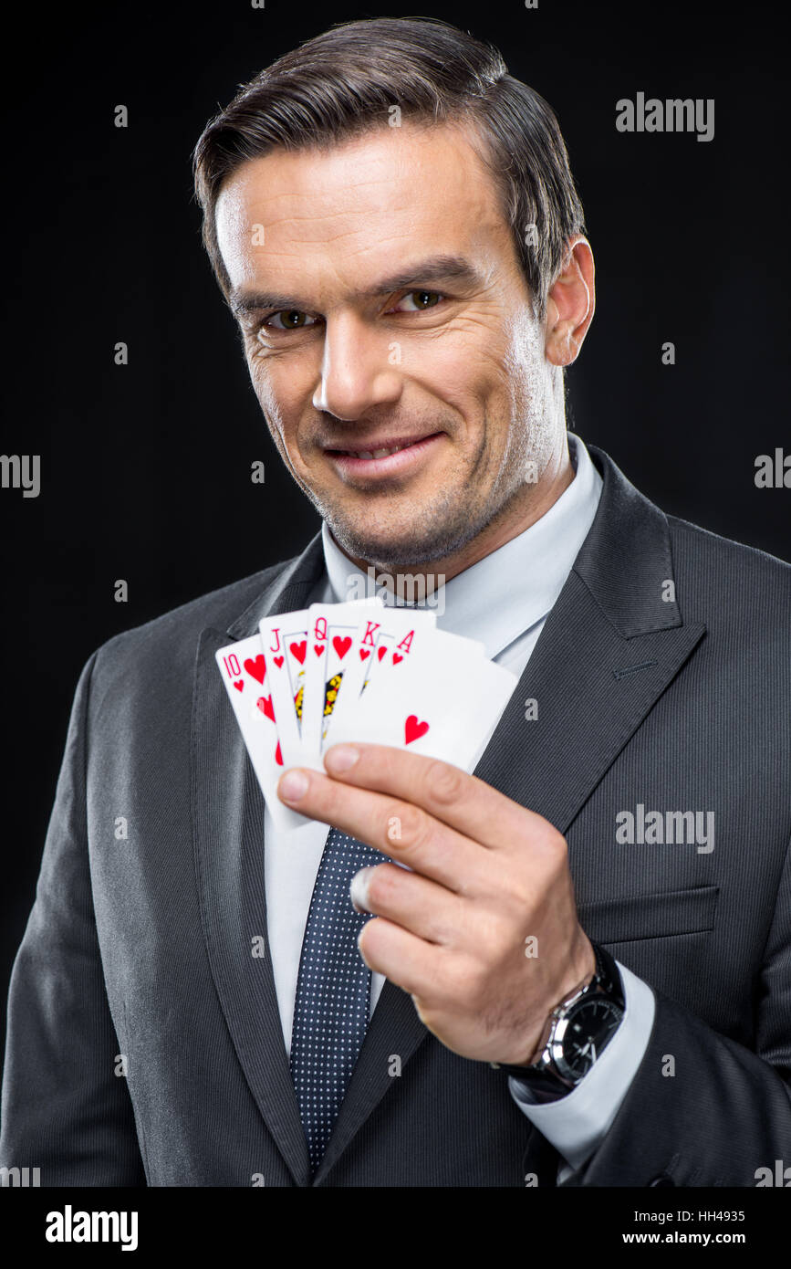 Businessman business playing cards hi-res stock photography and images ...