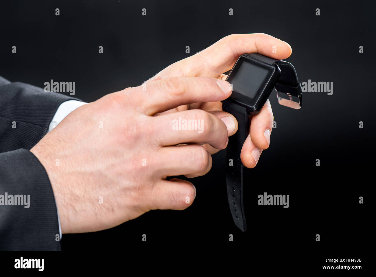 Close-up partial view of man touching screen of his smartwatch Stock ...