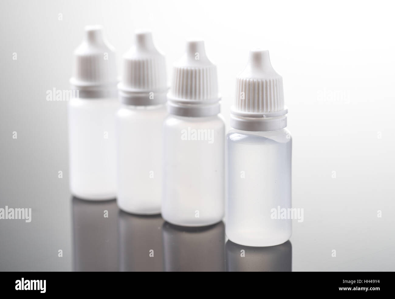 medical bottles for samples, medication, fluids. they stand in a row ...