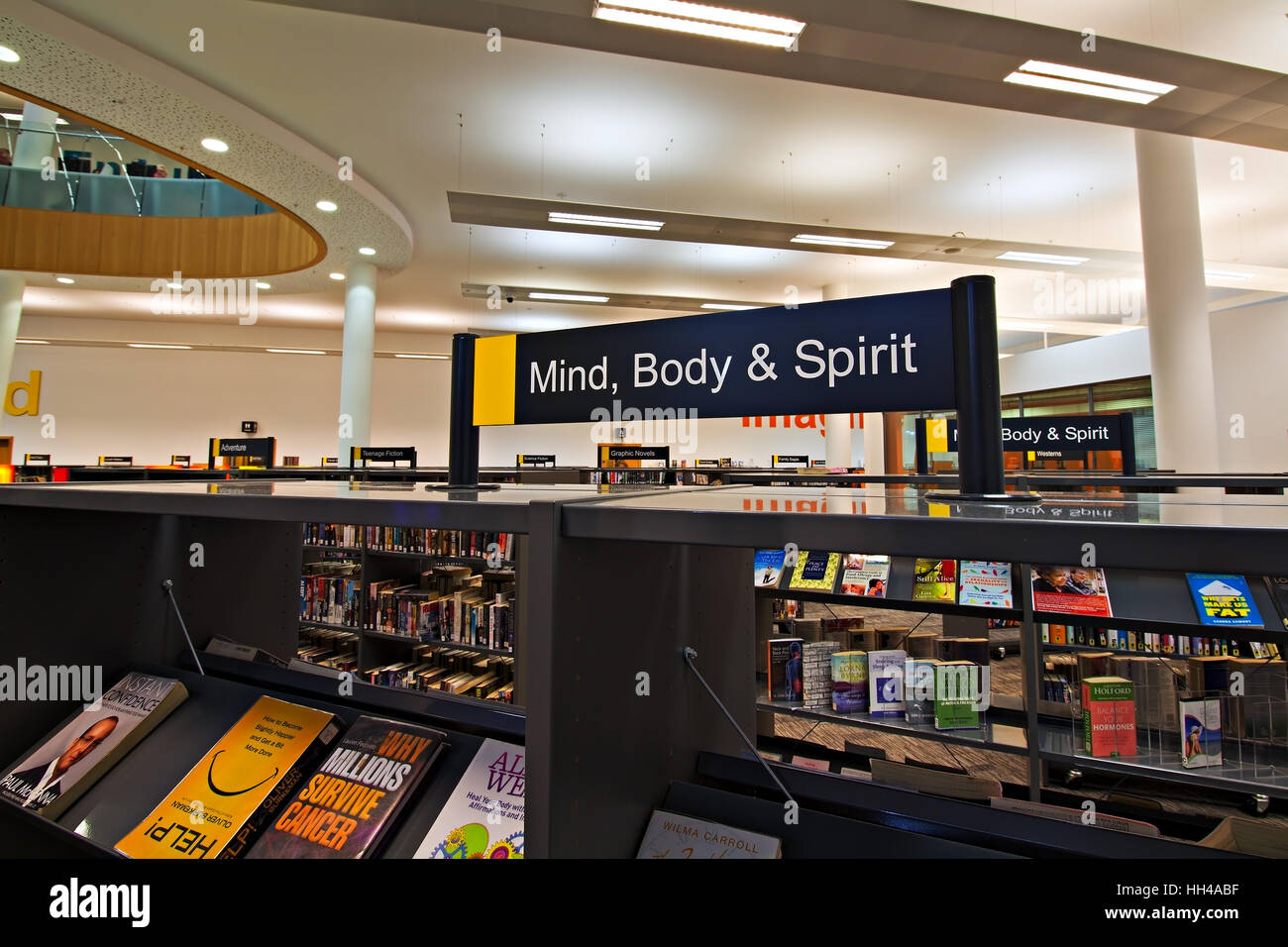 Mind Body and Spirit section inside a public library Stock Photo - Alamy