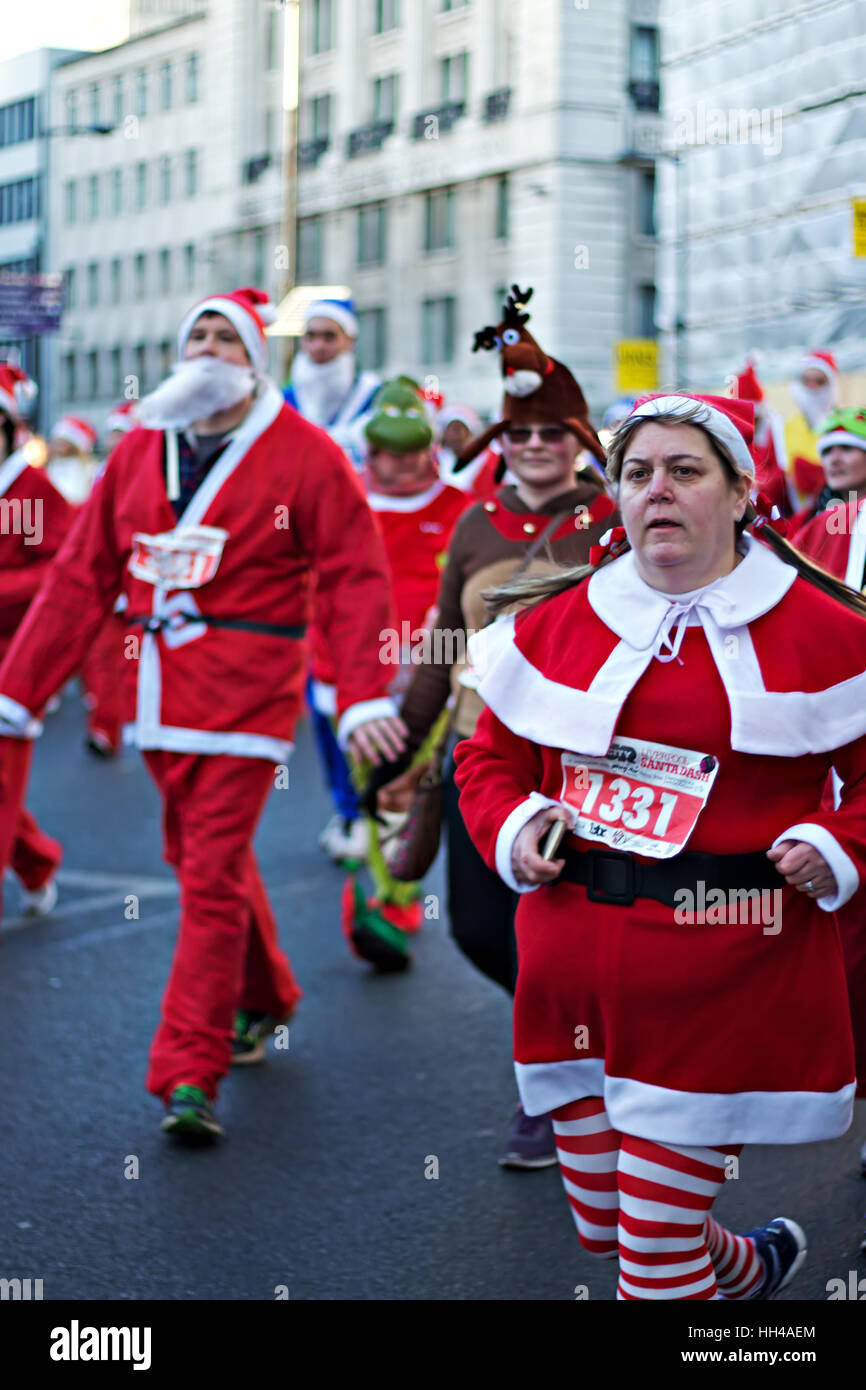 Runners taking part in the Santa Dash in Liverpool, an annual 5k fun ...