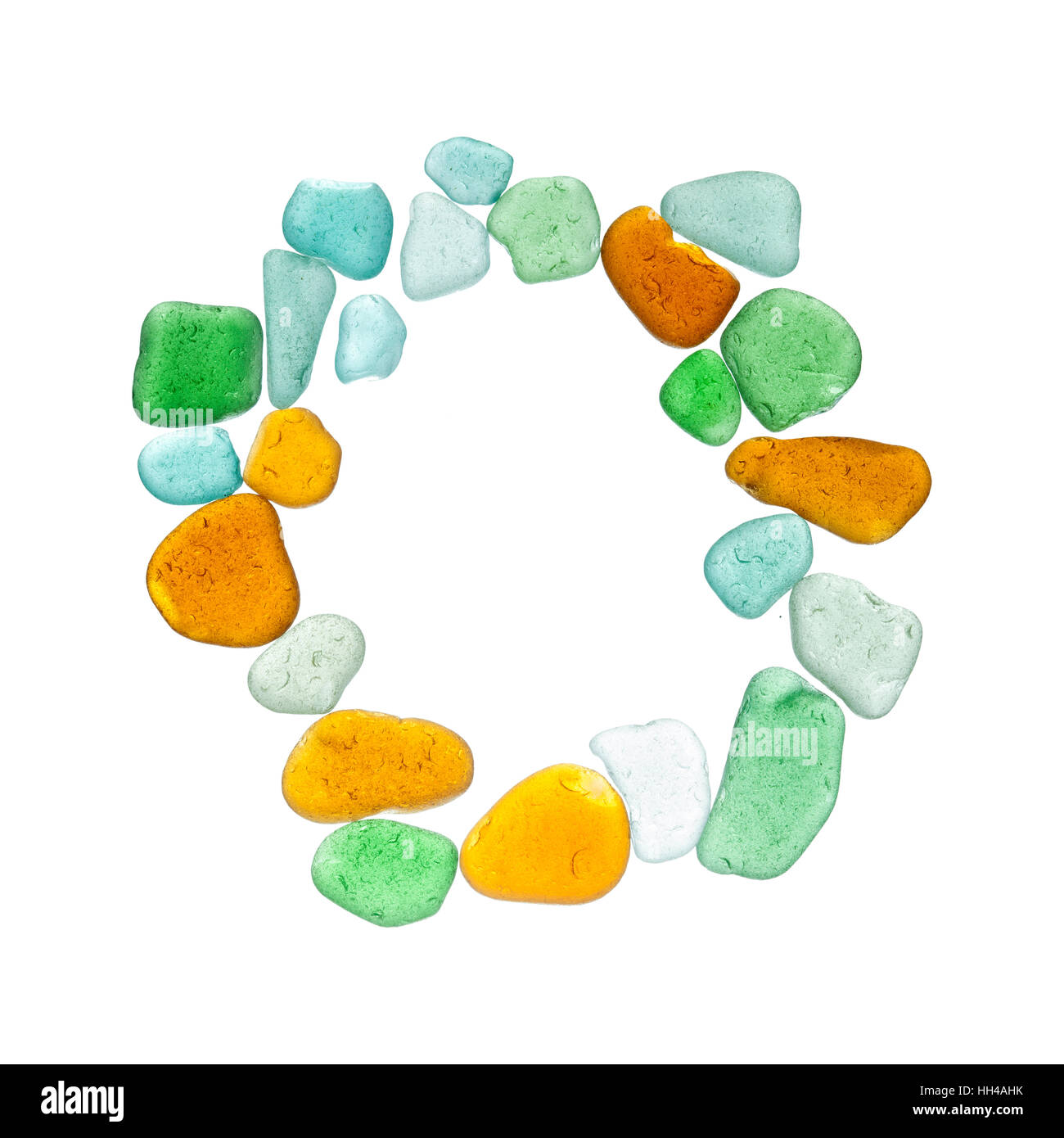 backlit sea glass peices isolated on white background Stock Photo - Alamy
