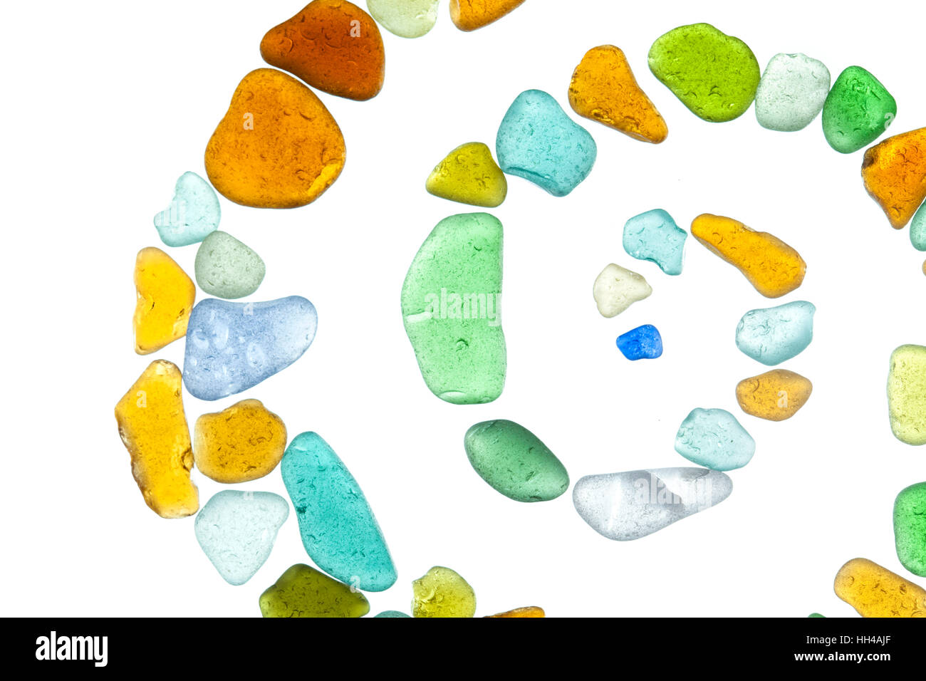backlit sea glass peices isolated on white background Stock Photo - Alamy