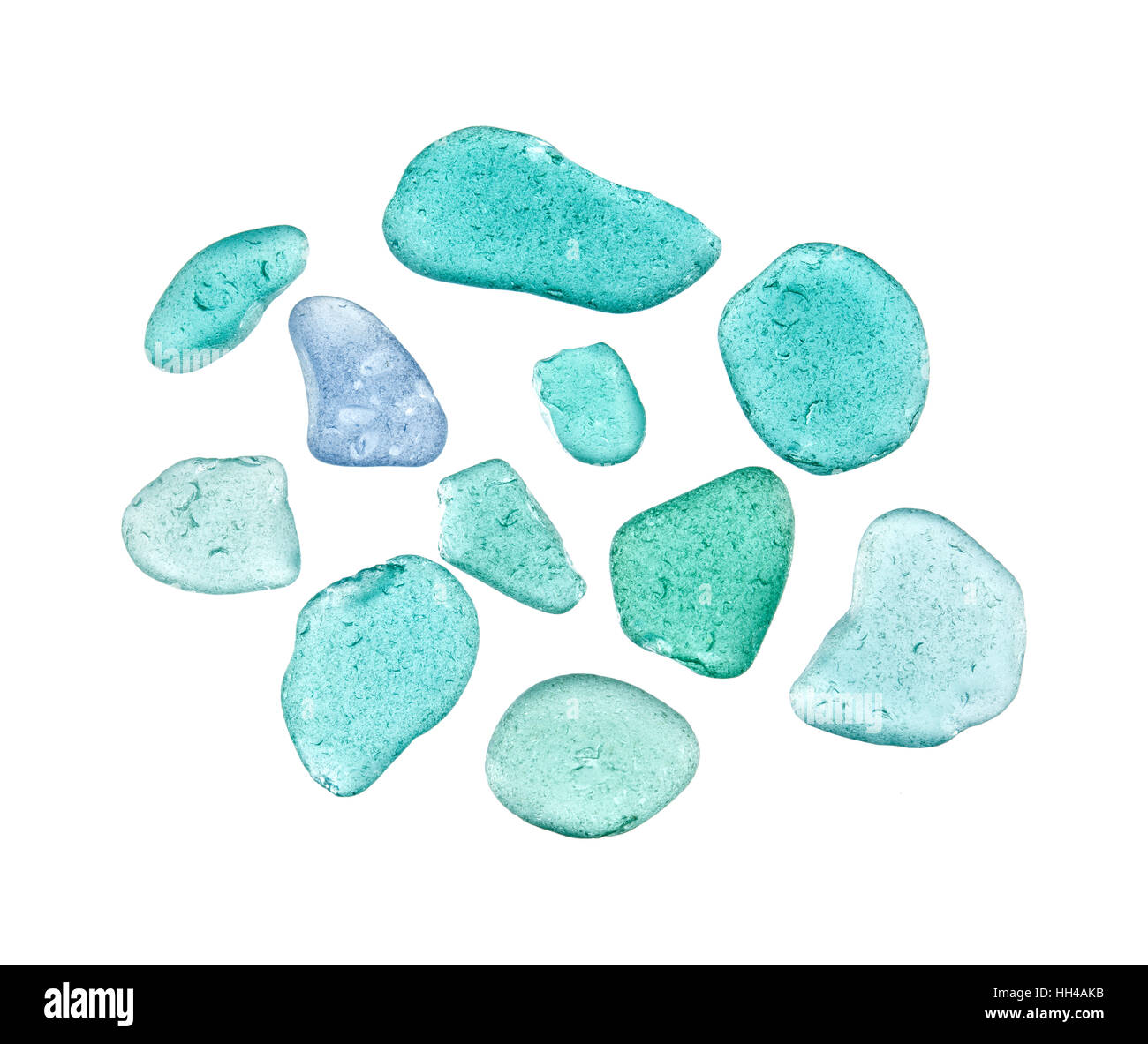 backlit sea glass peices isolated on white background Stock Photo - Alamy