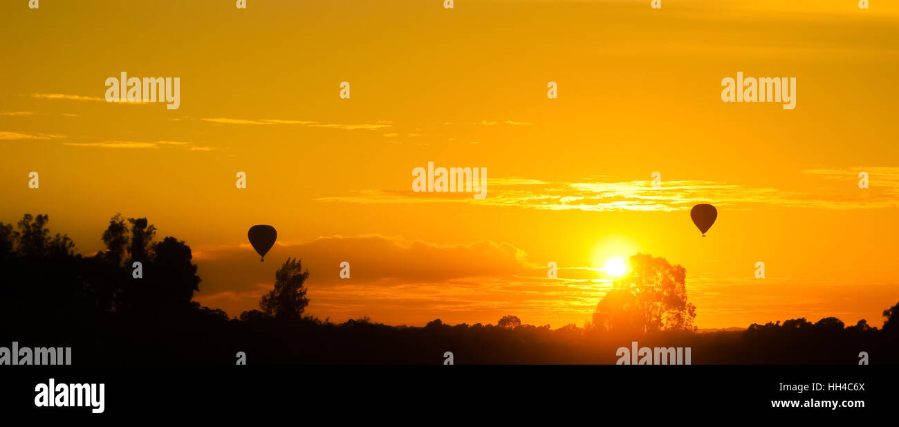 Sunset with hot-air balloons Stock Photo - Alamy