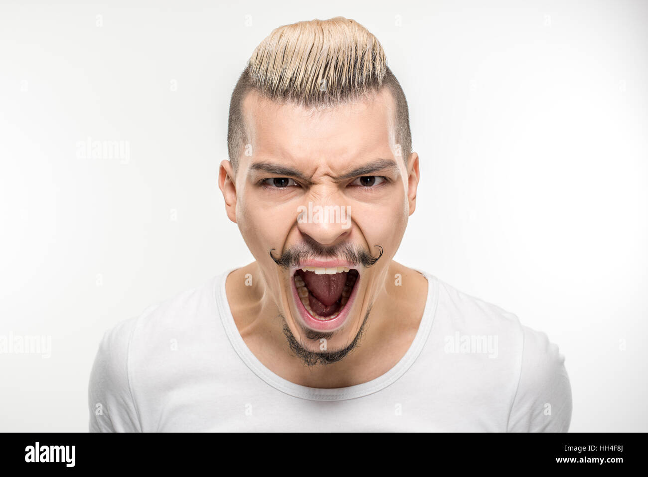 Portrait man screaming on white hi-res stock photography and images - Alamy
