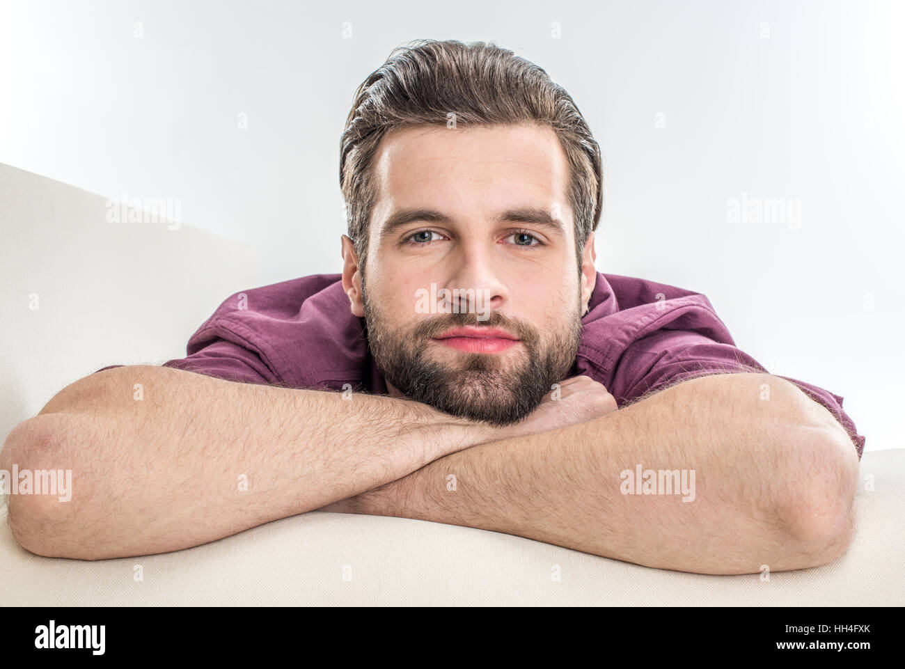 Close-up portrait of handsome bearded man looking at camera Stock Photo ...
