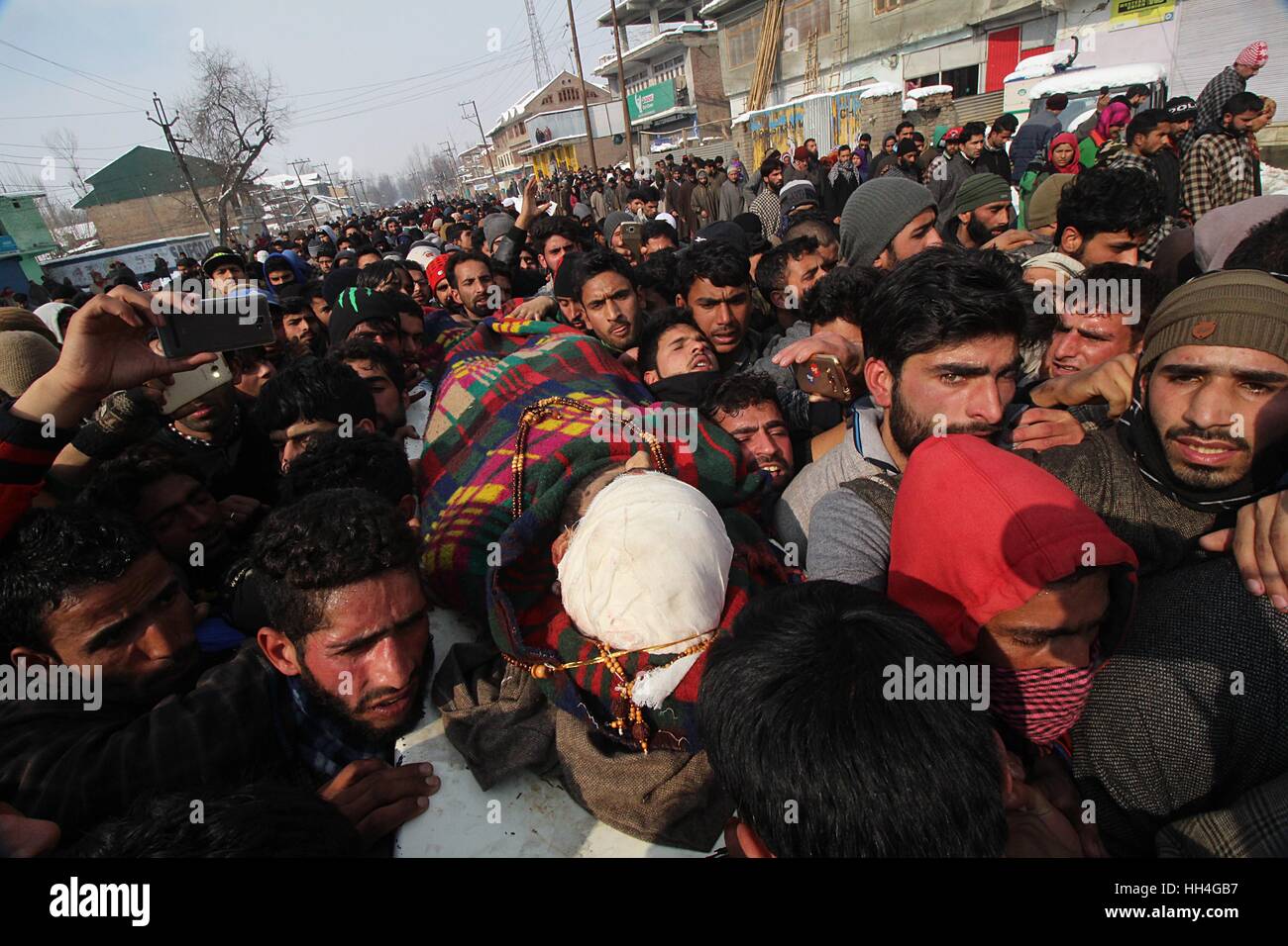 India. 16th Jan, 2017. People carry the dead body of Adil Ahmad Reshi ...