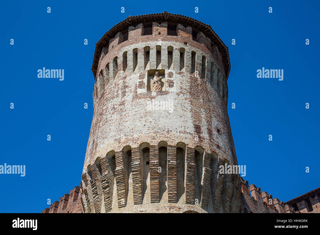 Tower of medieval italian castle on blue sky Stock Photo - Alamy